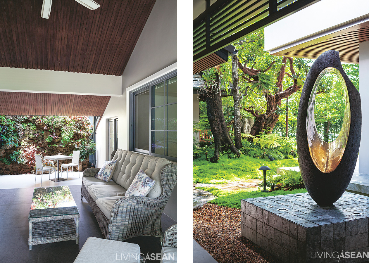 An Airy Home Warmly Cocooned within Lush Gardens / Living Asean