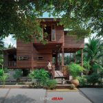 A Wooden House amid the Lush Coconut Groves / Living Asean