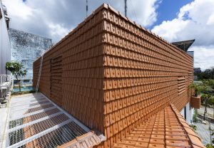 Tile House: Façades of Glimmering Tiles with a Story to Tell / Living Asean
