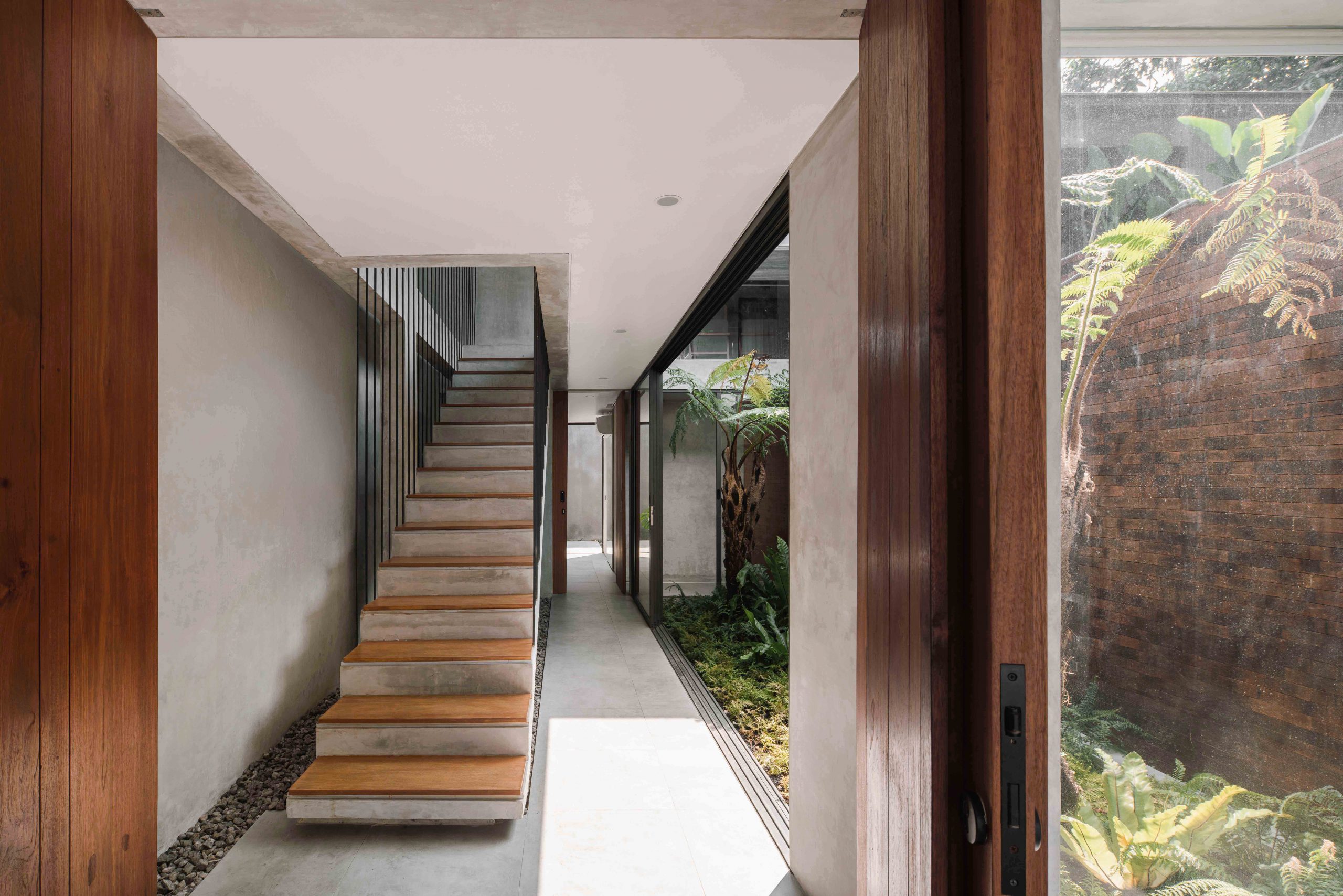 ACH House: An Airy and Well Composed Indonesian Home / Living Asean