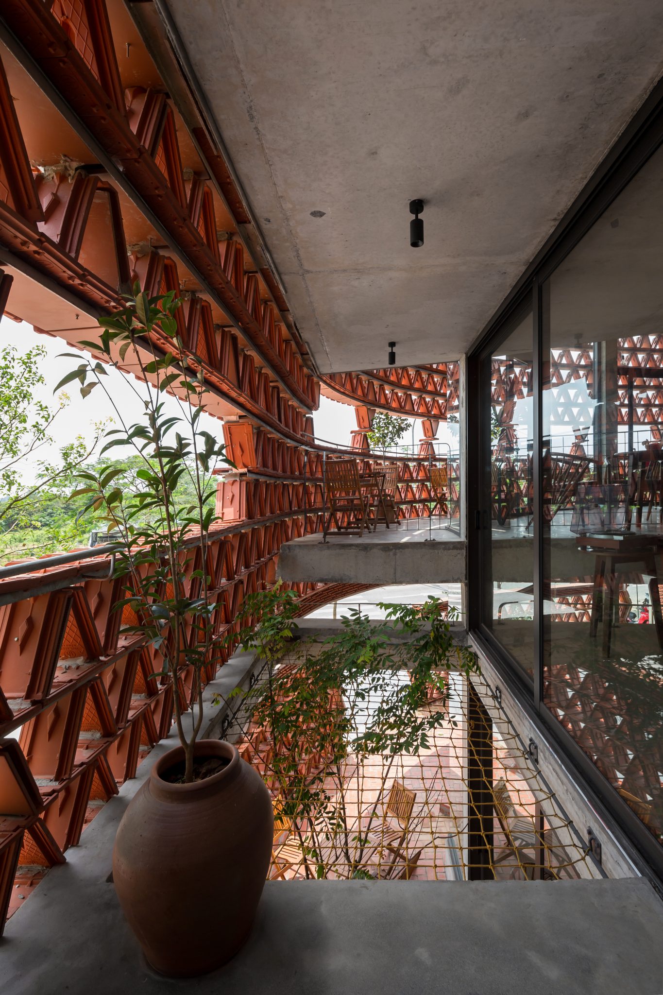 Ngói Space: Vibrant Orange Community Center Beautifies Hanoi Suburb ...