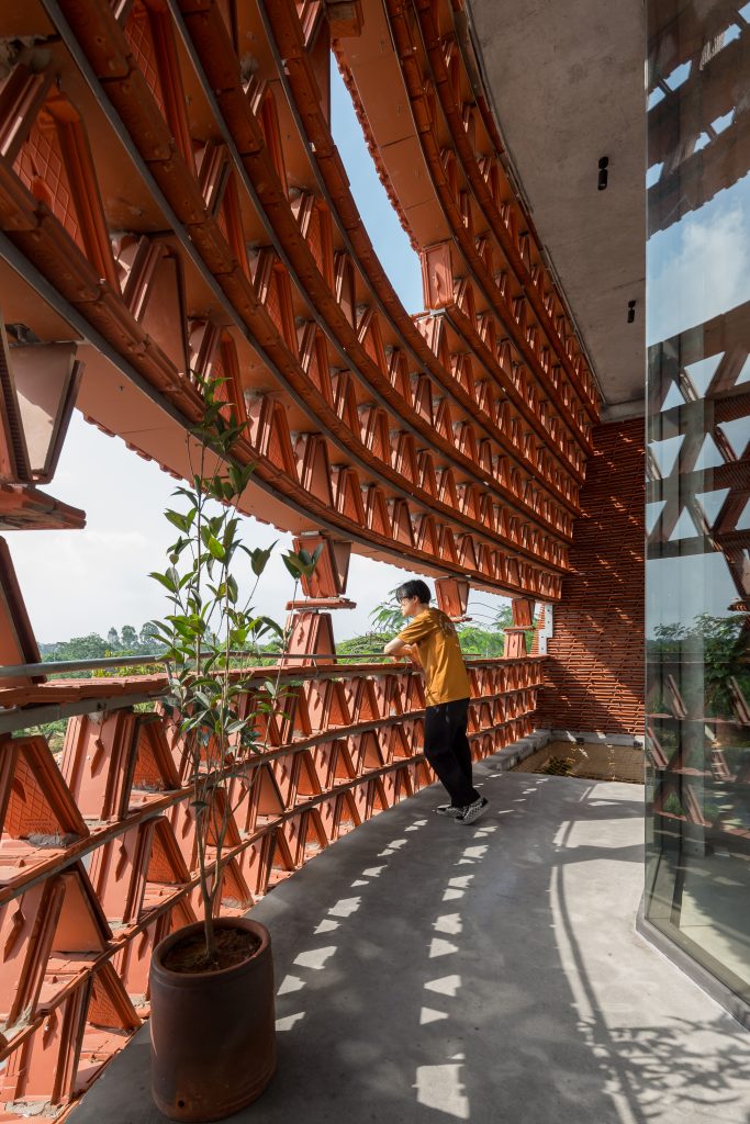 Ngói Space: Vibrant Orange Community Center Beautifies Hanoi Suburb ...