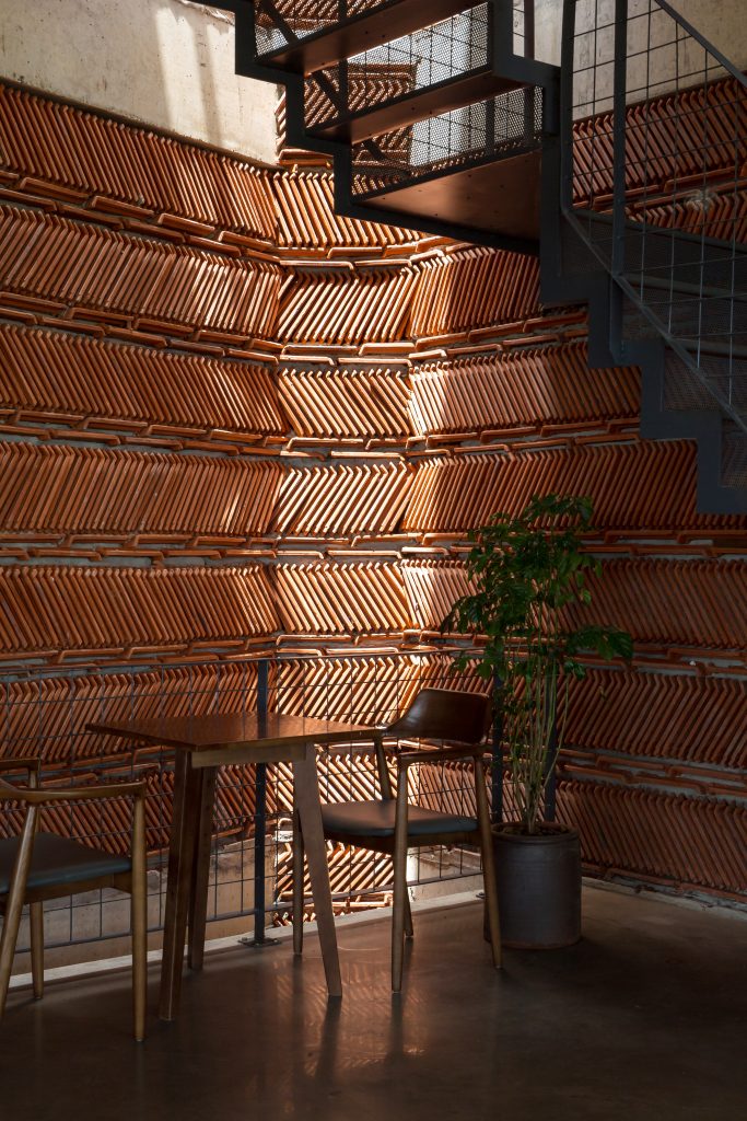 Ngói Space: Vibrant Orange Community Center Beautifies Hanoi Suburb ...