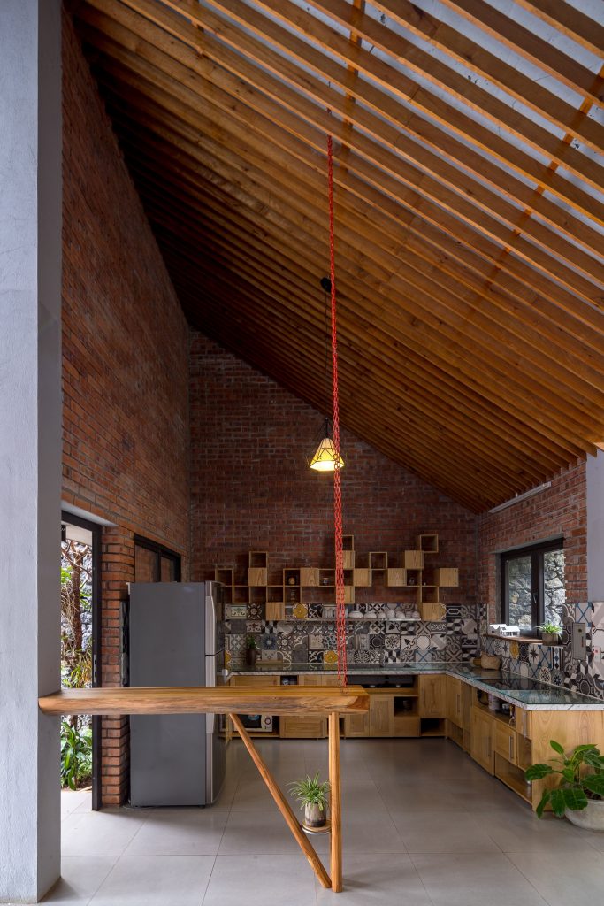TB House: A One-Story Brick Home with Lush Greenery / Living ASEAN