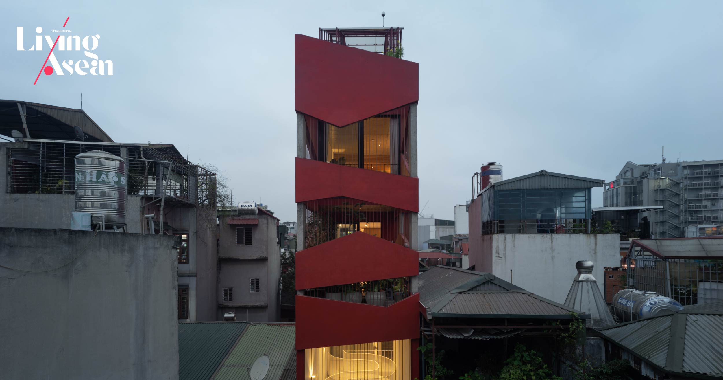 A Red-Facade House Stands Tall in the Fresh Air / Living ASEAN